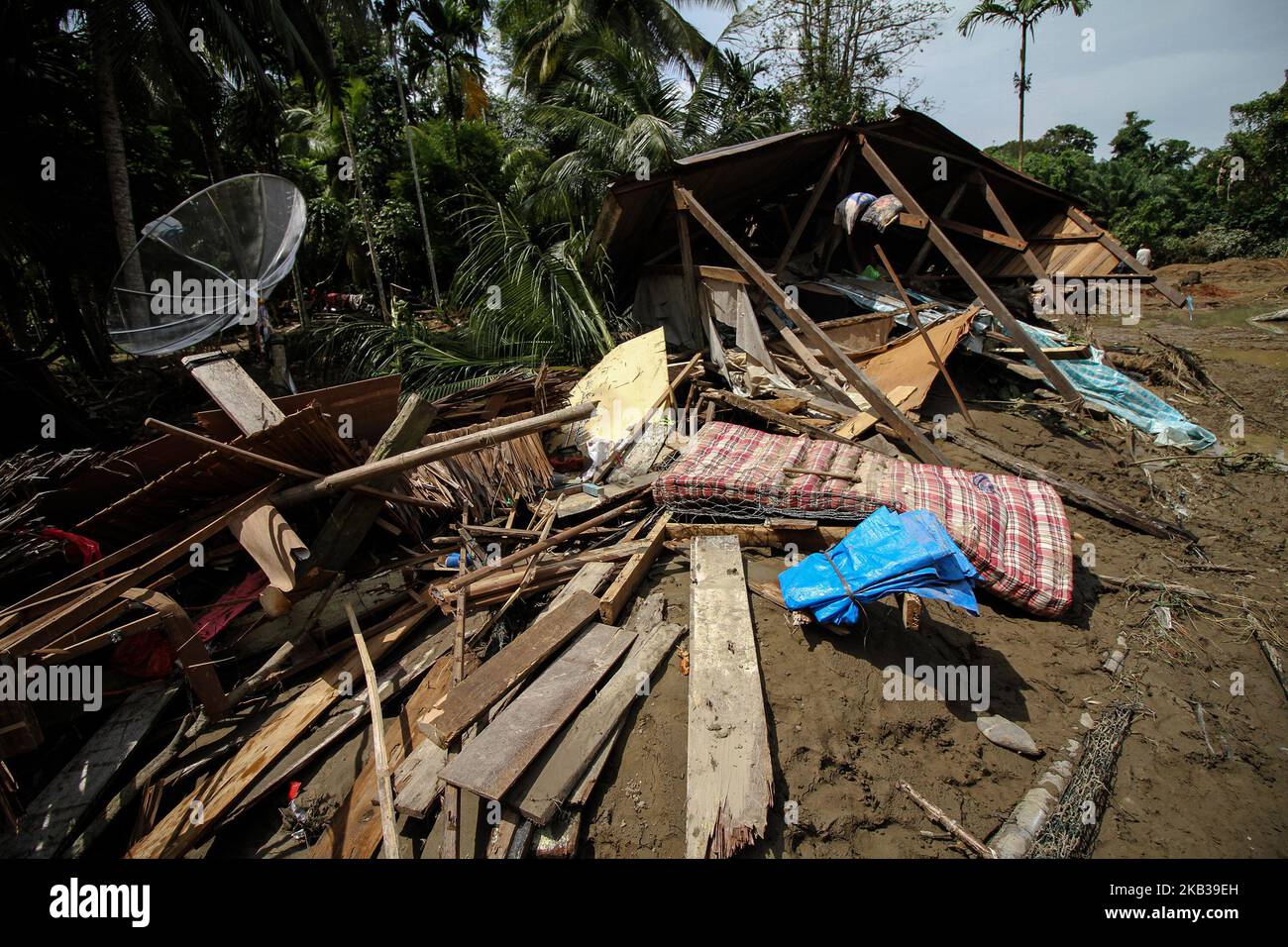 A picture showing debris from a house damaged after a flood caused by ...