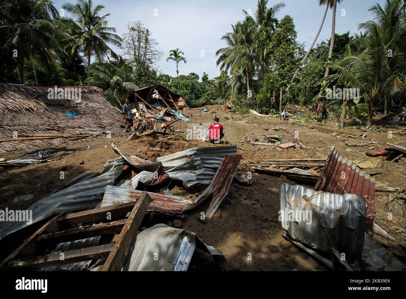 A picture showing debris from a house damaged after a flood caused by ...