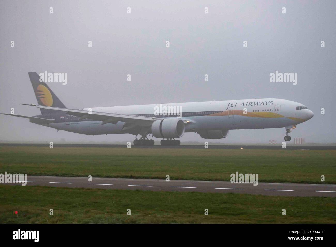 Jet Airways Boeing 777-300 in the mist at Amsterdam Schiphol ...