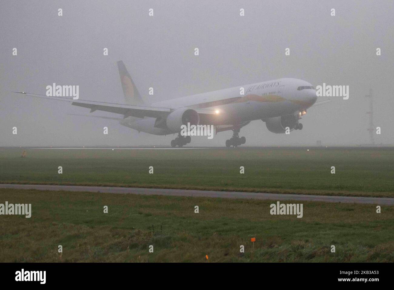 Jet Airways Boeing 777-300 in the mist at Amsterdam Schiphol ...