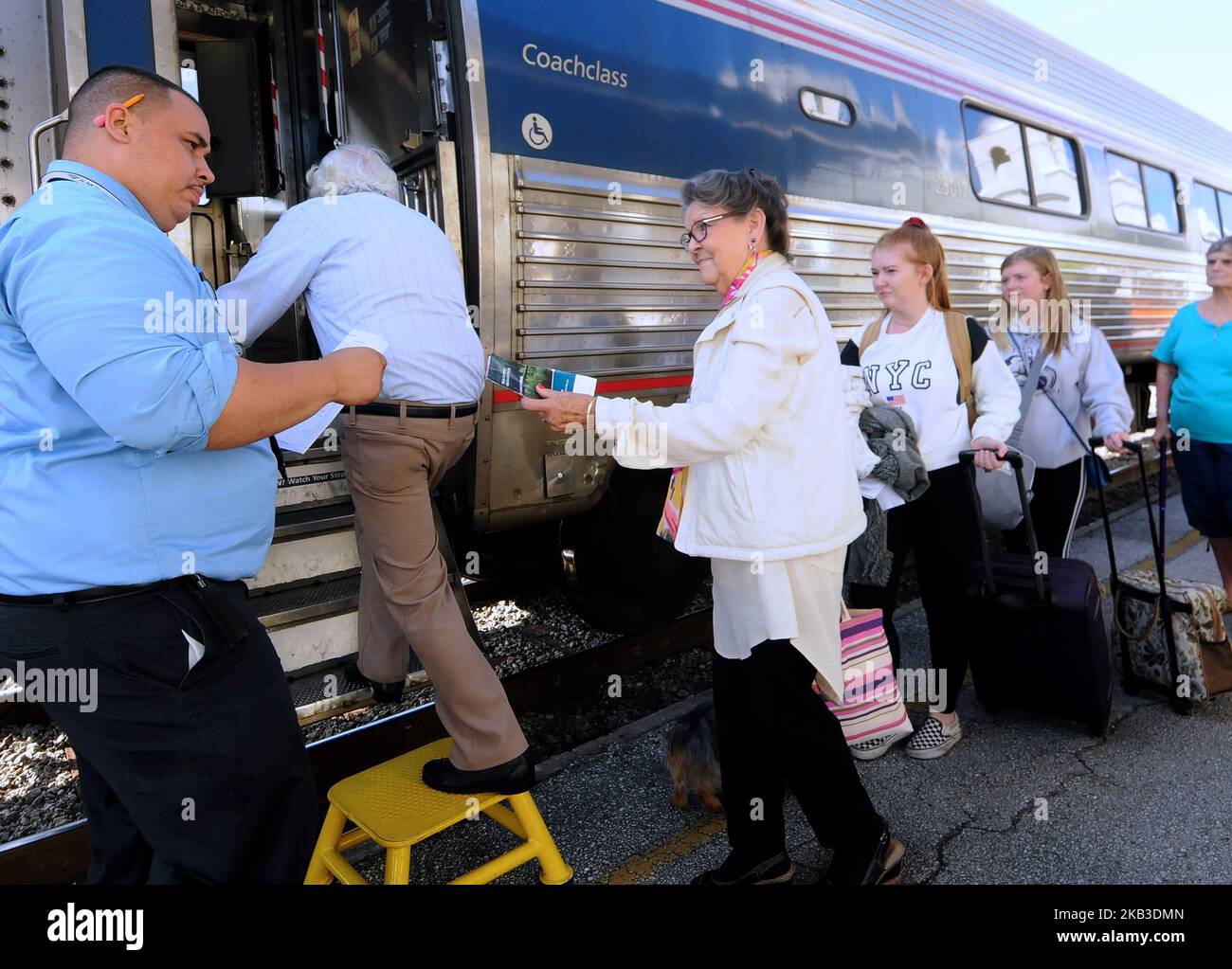 Passengers board a northbound Amtrak train on Thanksgiving eve at the ...