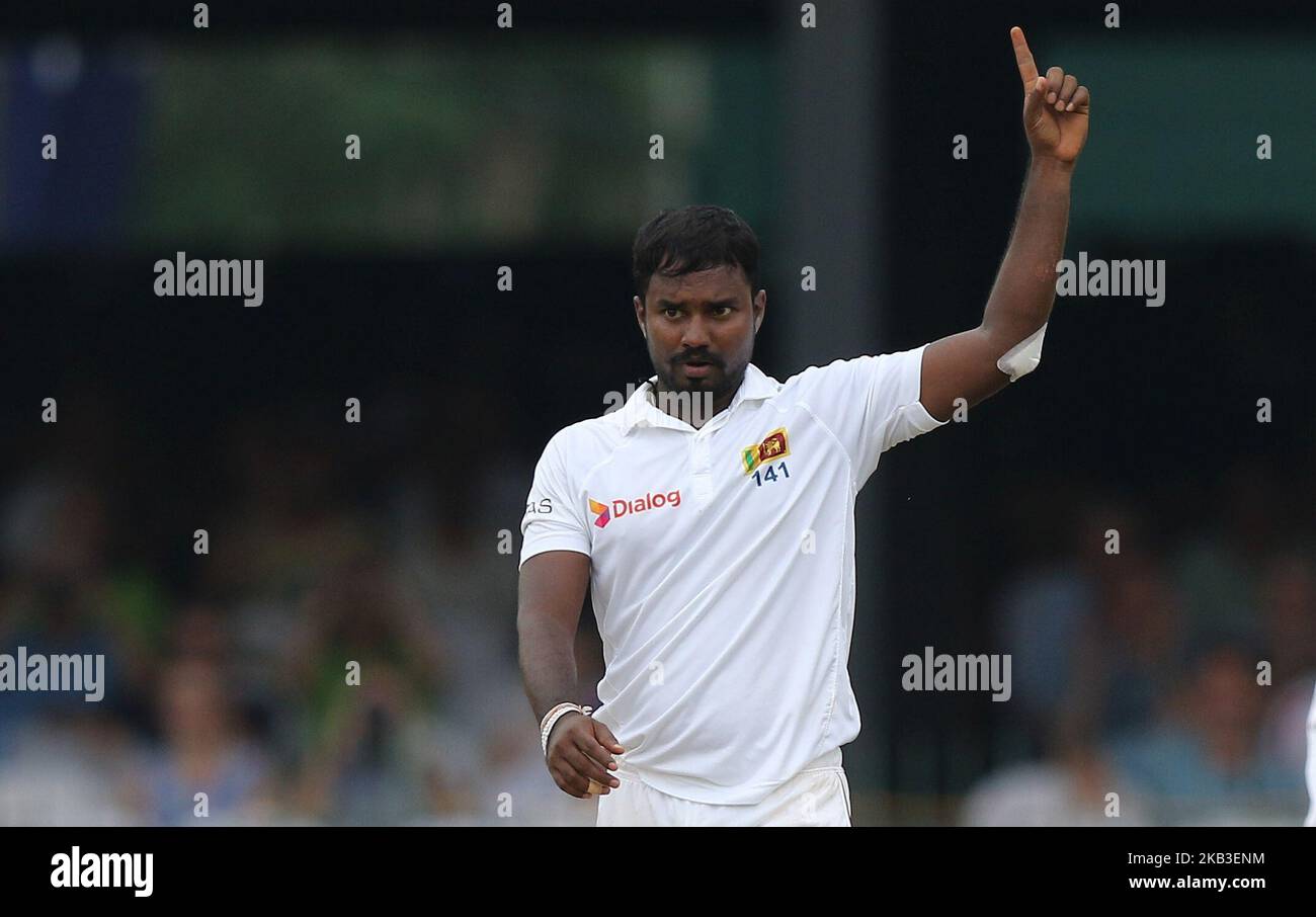Sri Lankan cricketer Malinda Pushpakumara celebrates after taking a ...