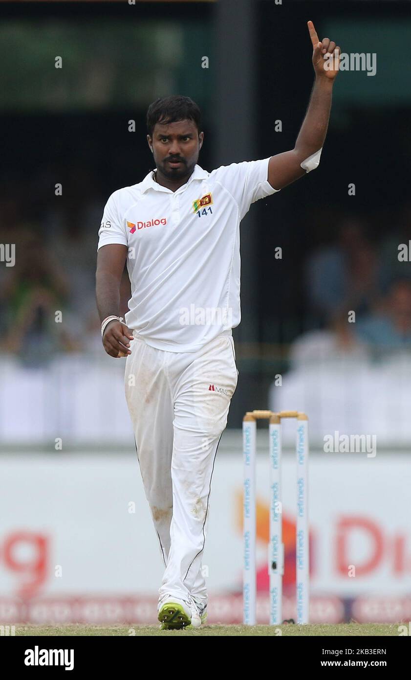 Sri Lankan cricketer Malinda Pushpakumara celebrates after taking a ...