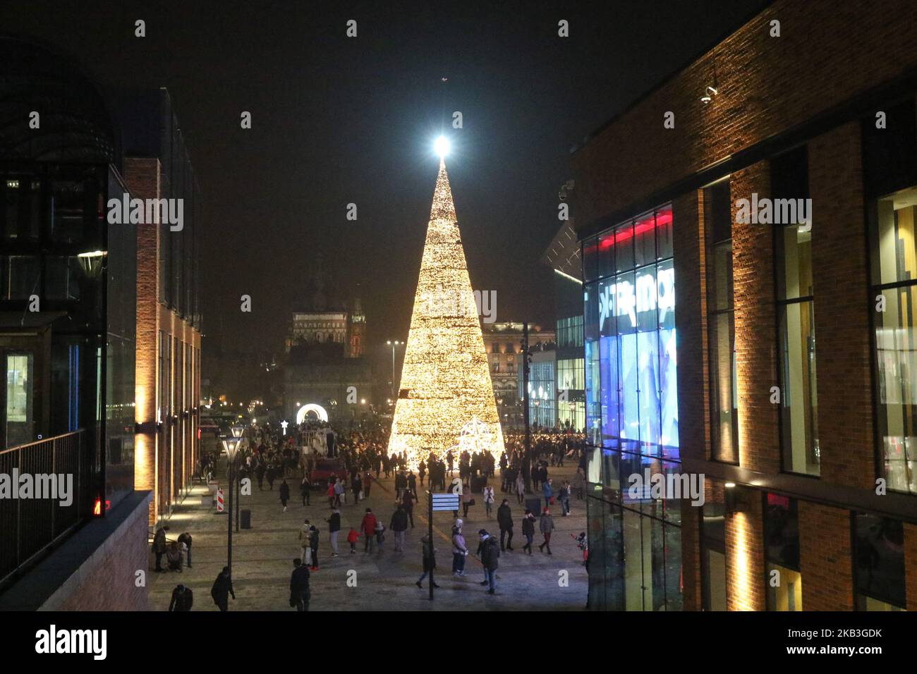 Crowd admiring Christmas tree lights is seen in Gdansk, Poland on 24 ...