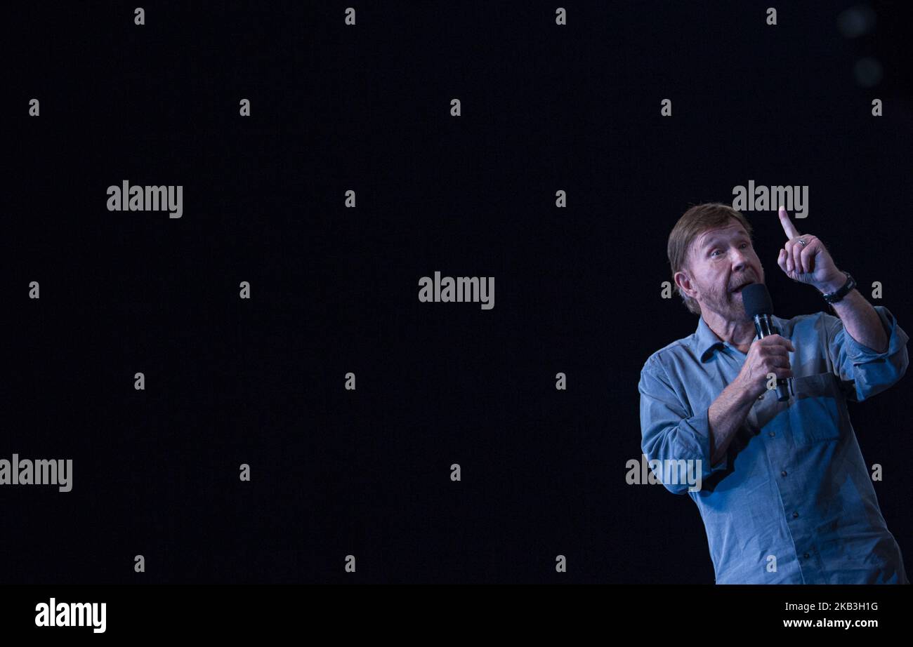 Chuck Norris makes a presentation during Baptista Aid charity event on ...