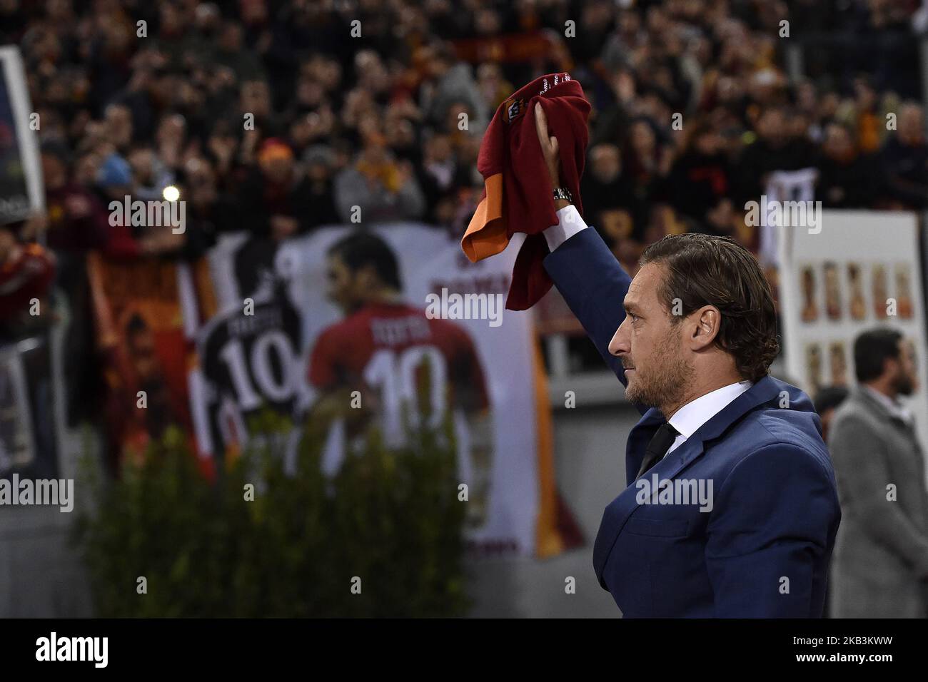 AS Roma former player Francesco Totti holds the Hall of Fame jersey ...