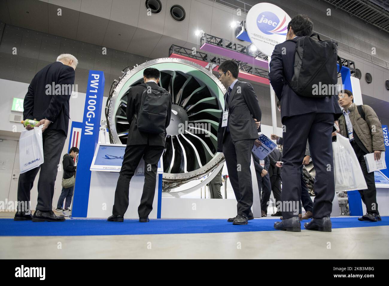 A visitors look at Jaec PV1100G-JM engine during Japan Aerospace 2018 ...