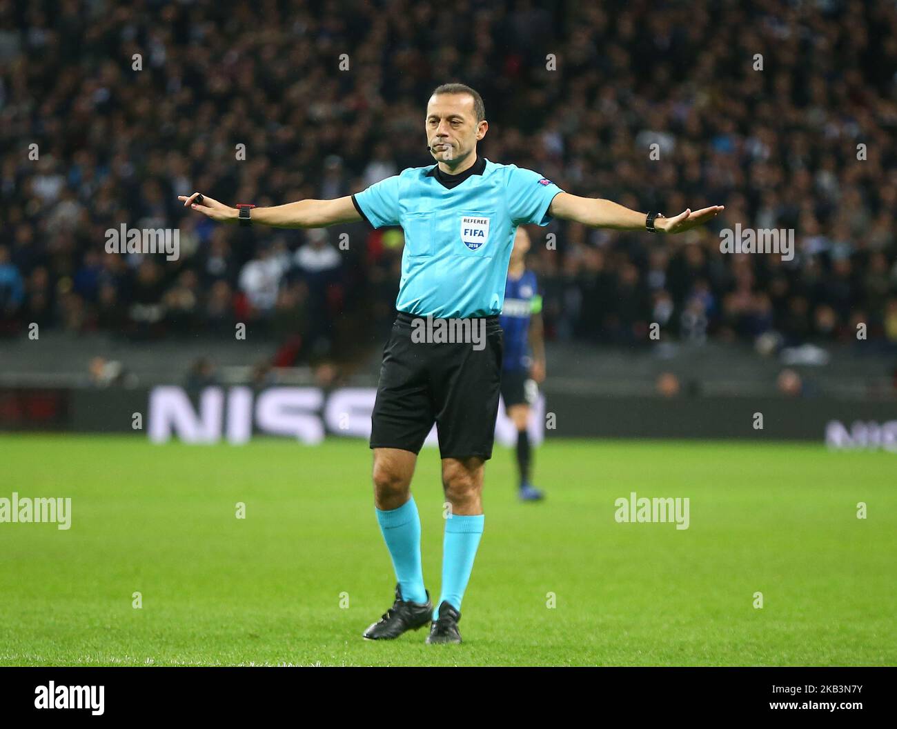 Referee Cuneyt Cakir of Turkey during Champion League Group B between ...