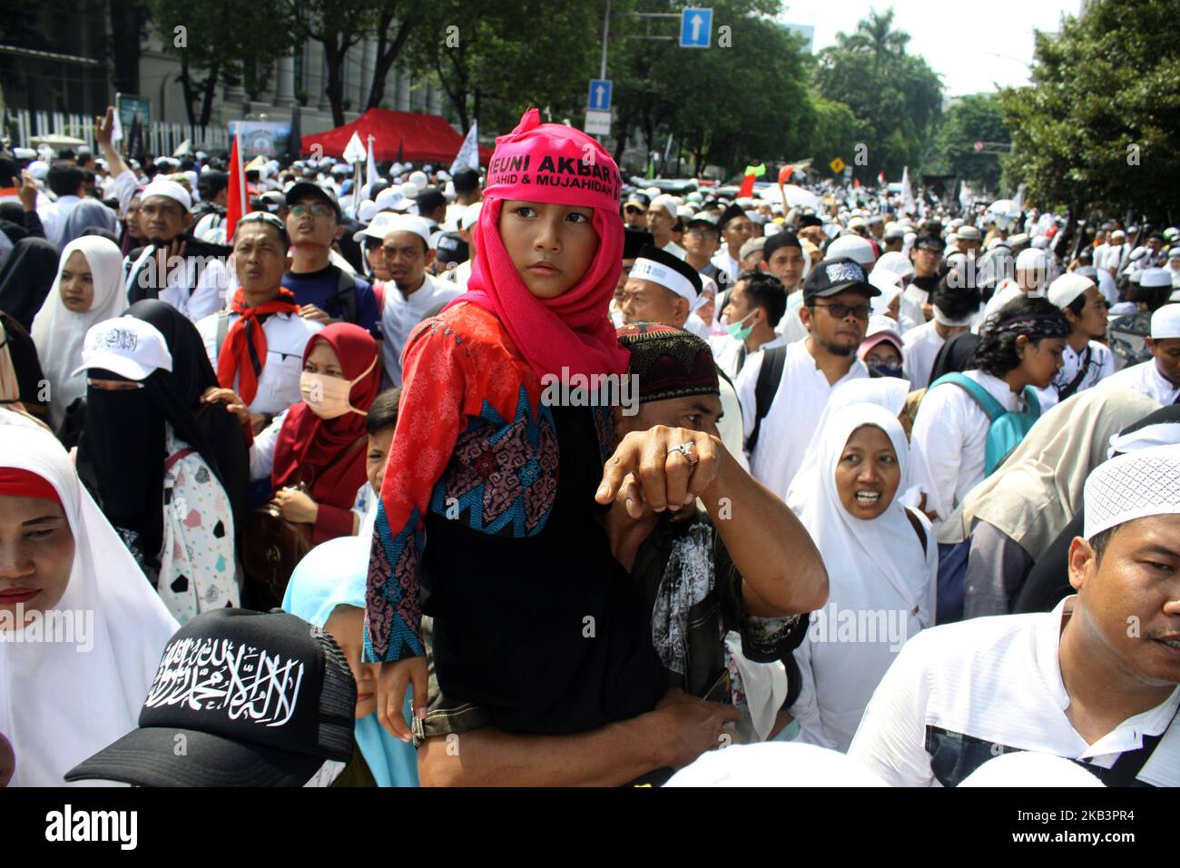 Millions of Muslims from various regions in Indonesia attend a mass reunion at National Munumen ...