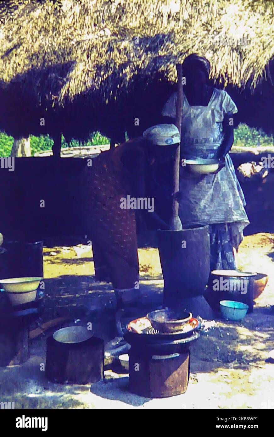 African women preparing food outdoors in Bomboi, Ghana, c.1959 Stock ...