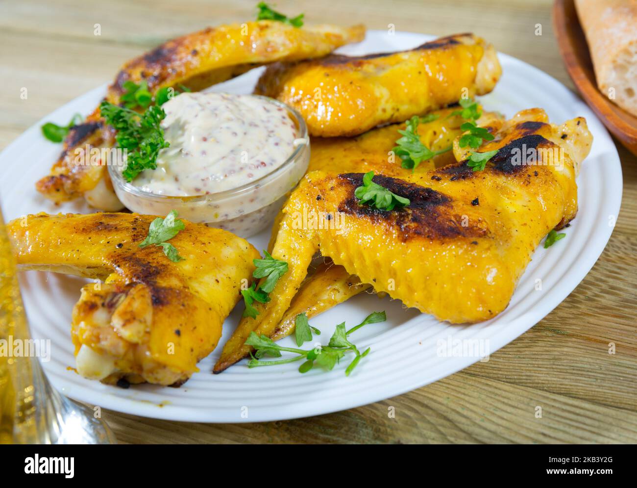 Crispy chicken wings greens hi-res stock photography and images - Alamy