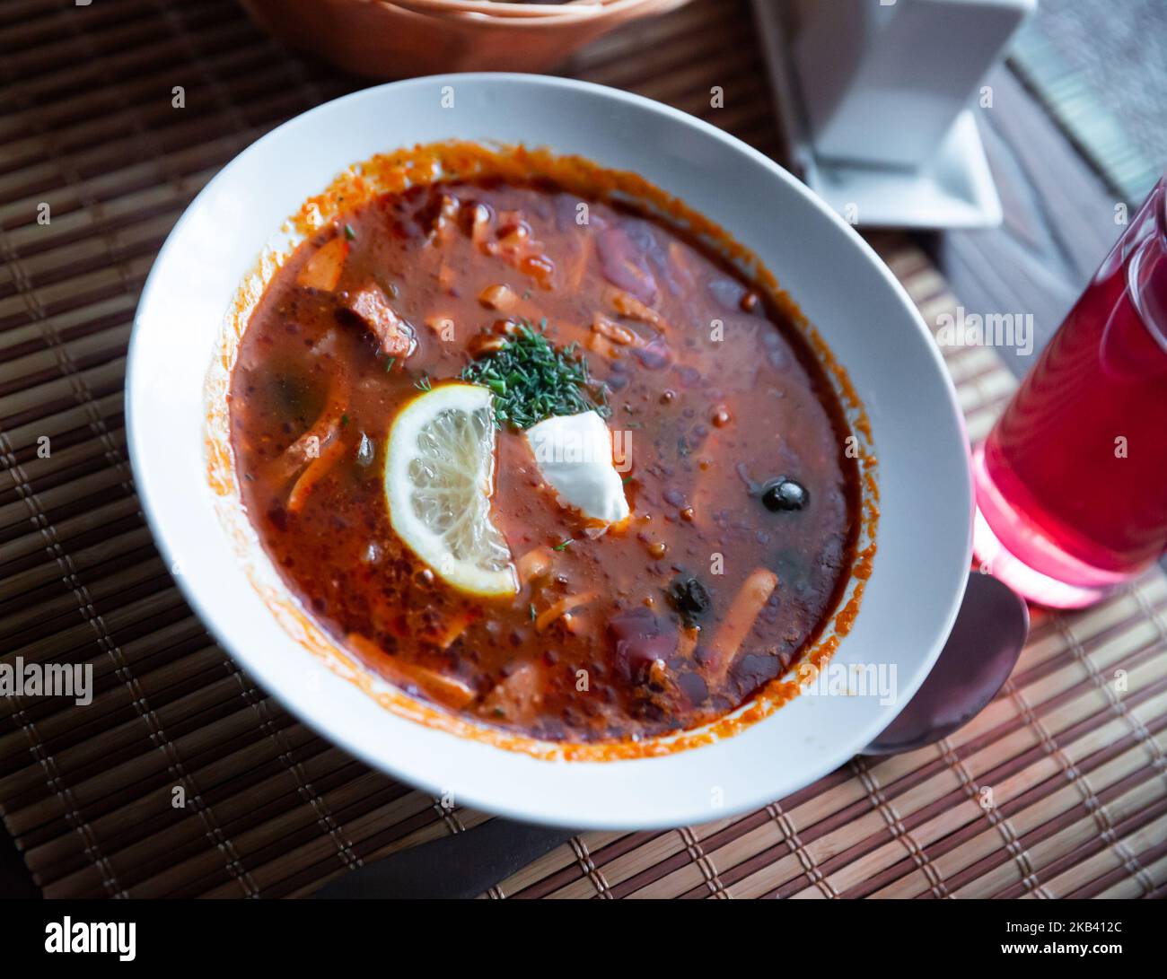 Russian cuisine - solyanka soup with ingredients Stock Photo - Alamy
