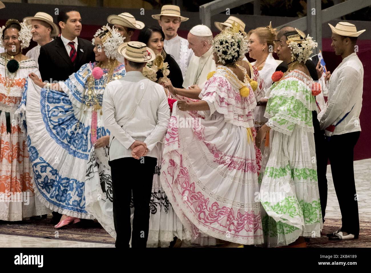 Faithful wearing traditional costumes from Panama pose for a family ...
