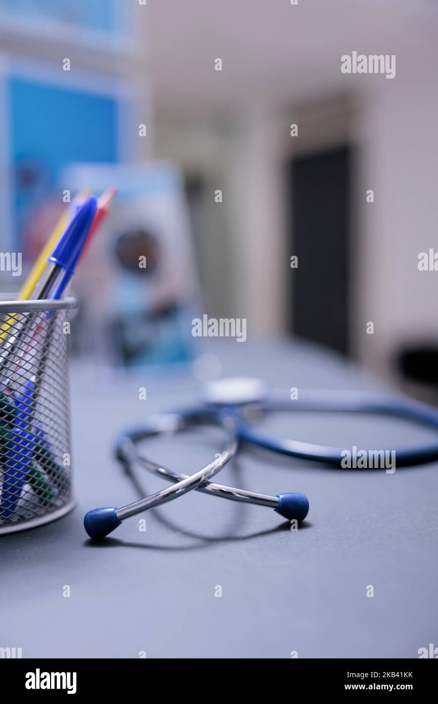 Medical equipment unused by anyone on empty table with hospital items ...