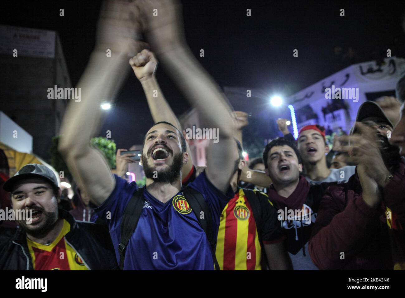 Fans chant songs as they attend the celebrations of the 100th ...
