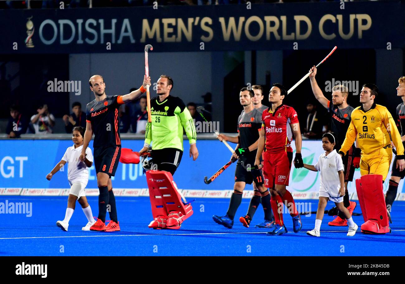 The teams make their way out for the start during the FIH Men's Hockey ...