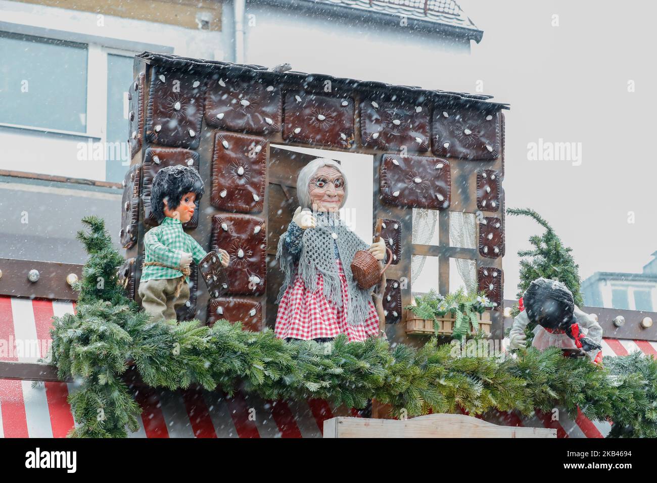 Hansel and Gretel and the old witch at her ginger bread house. The ...