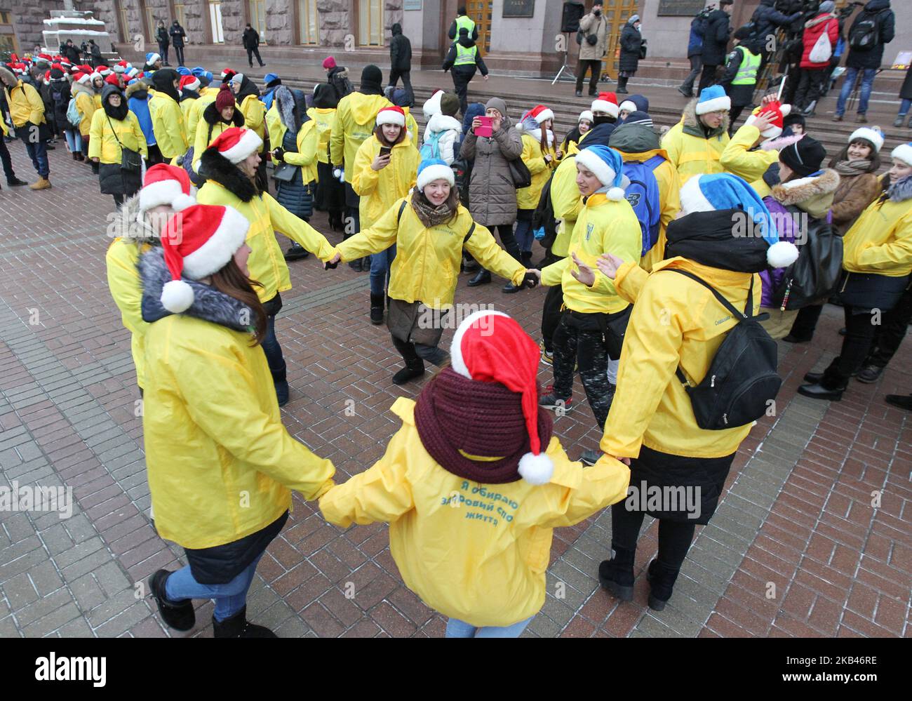 Youth from different Ukrainian social services dressed in Santa Claus ...