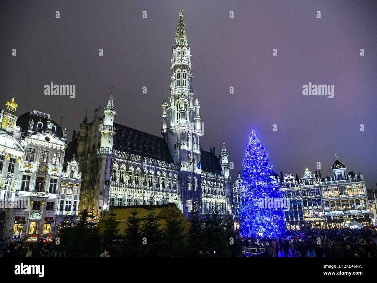 Christmas lights show on the Grand Place with a huge Christmas tree in ...