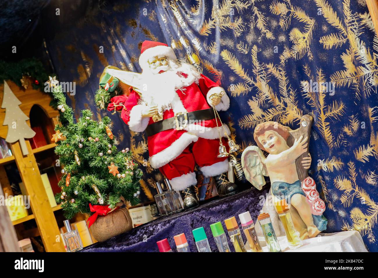 Christmas Tree next to a Santa Claus. Christmas Market in the Northern ...