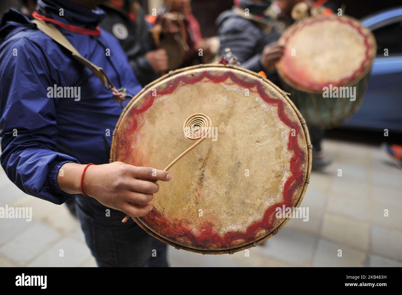 People from Newar community playing traditional instruments during a ...