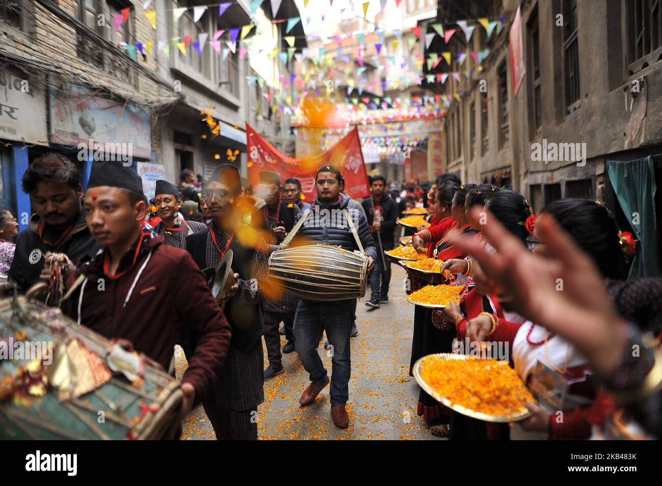 People from Newar community playing traditional instruments during a ...