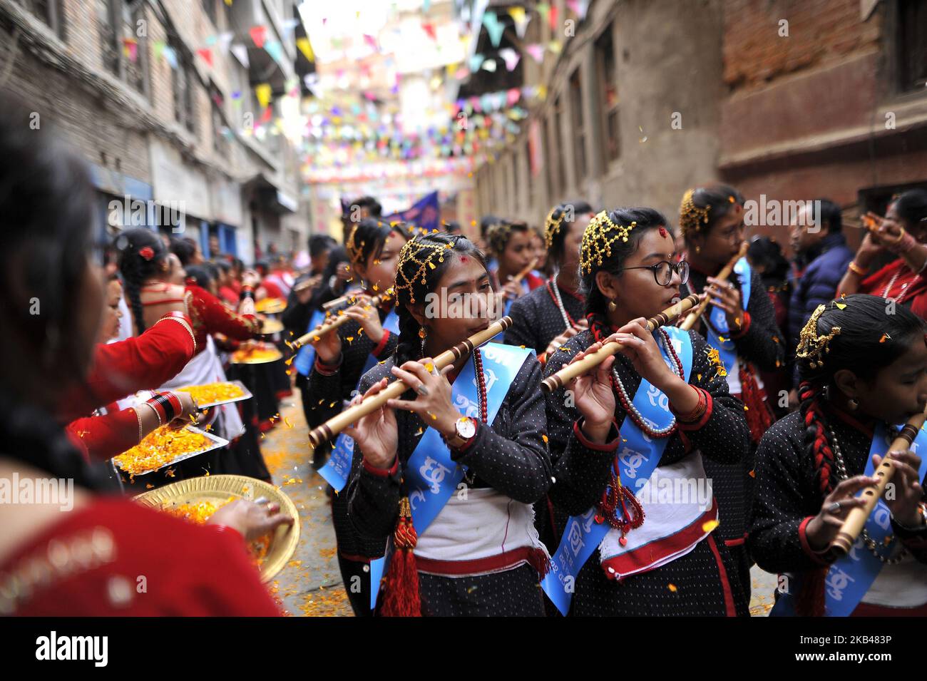 People from Newar community playing traditional instruments during a ...