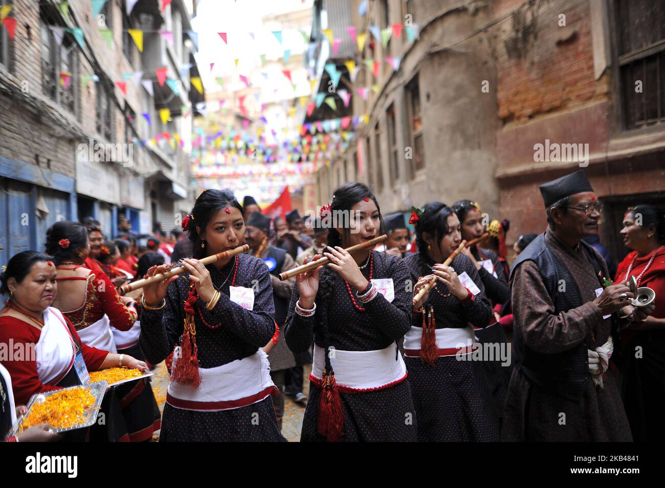 People from Newar community playing traditional instruments during a ...
