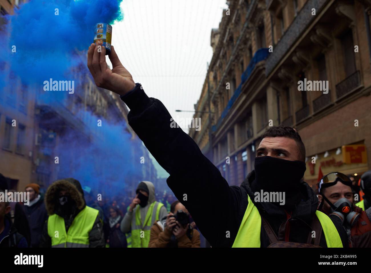 A Yellow Vest brandishes a blue somke. Act VI dubbed 'Revolt' of the ...
