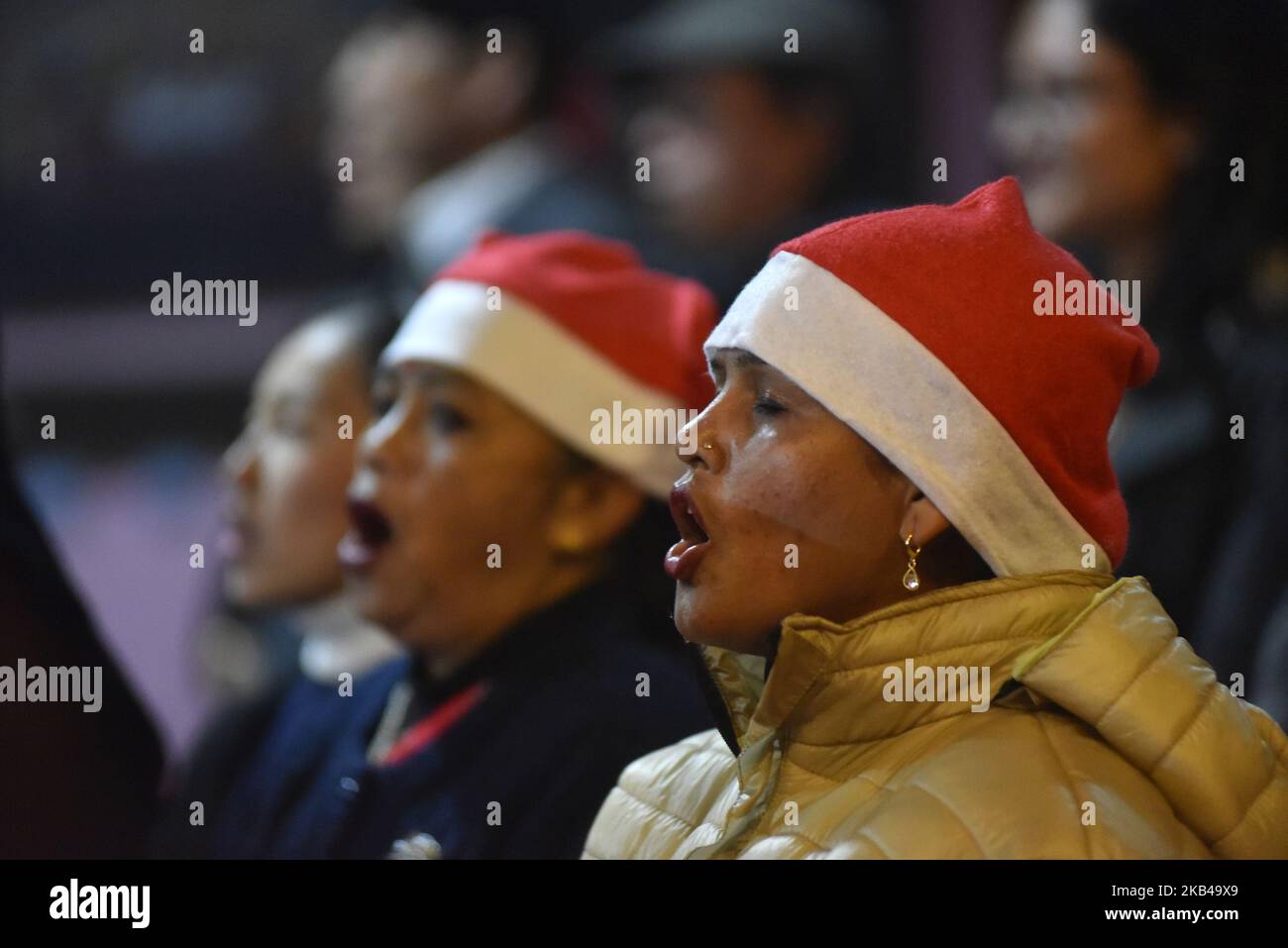 Nepalese Christian people attends on Holy Mass of worshipers singing ...
