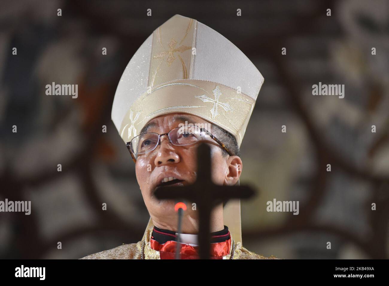 A Catholic priest performing holy rituals for the Holy Mass during ...