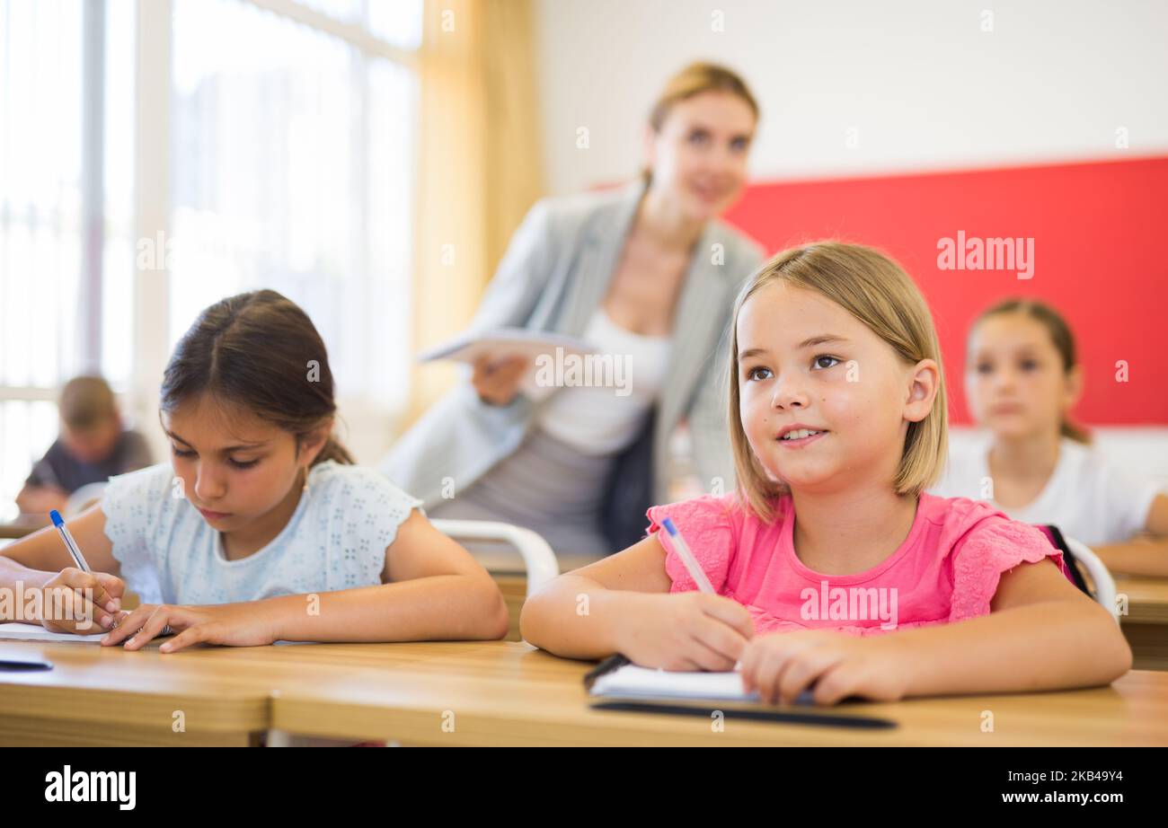 Pupils in classroom Stock Photo - Alamy