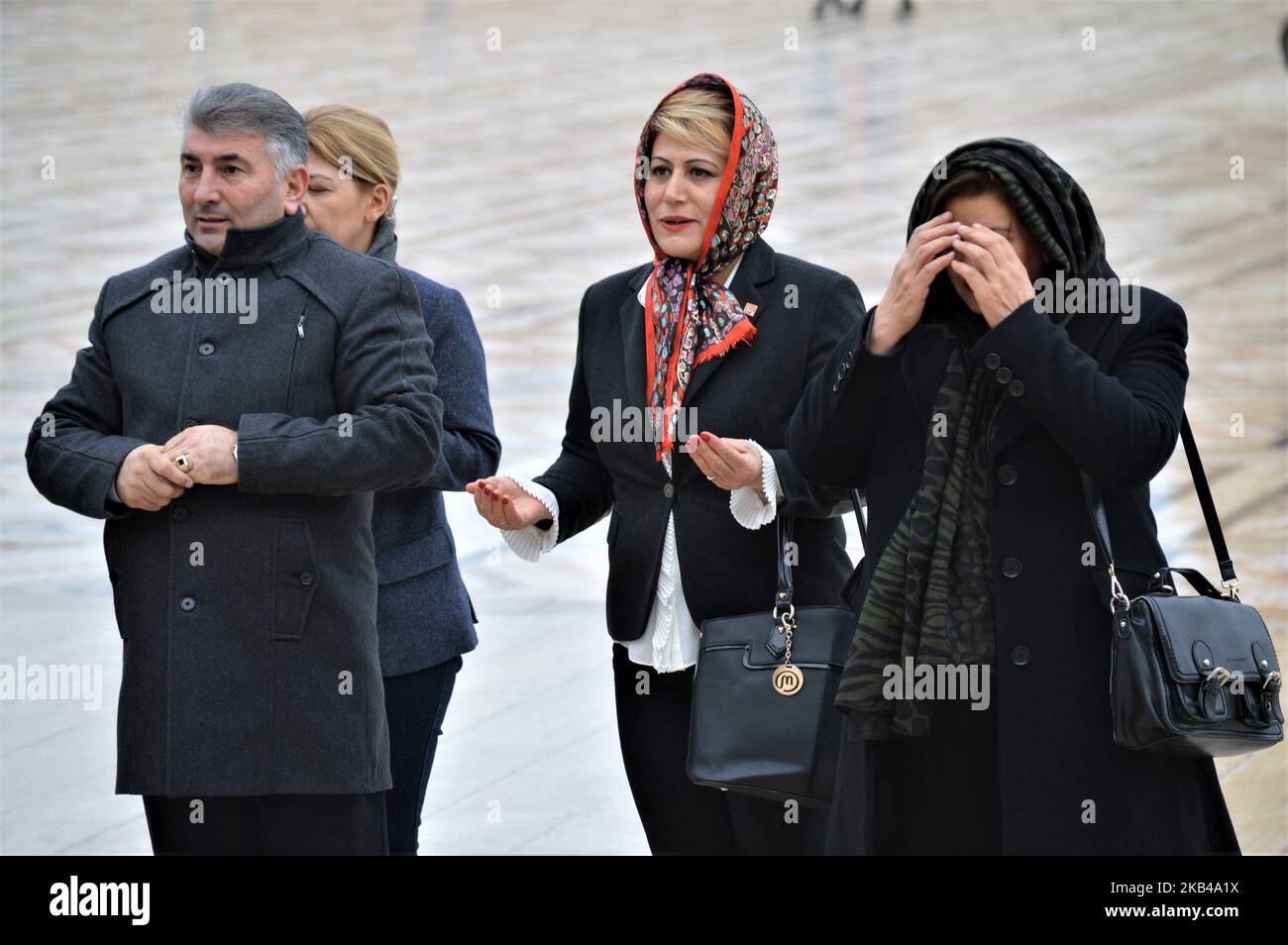 Visitors pray in front of the tomb of Ismet Inonu, modern Turkey's ...