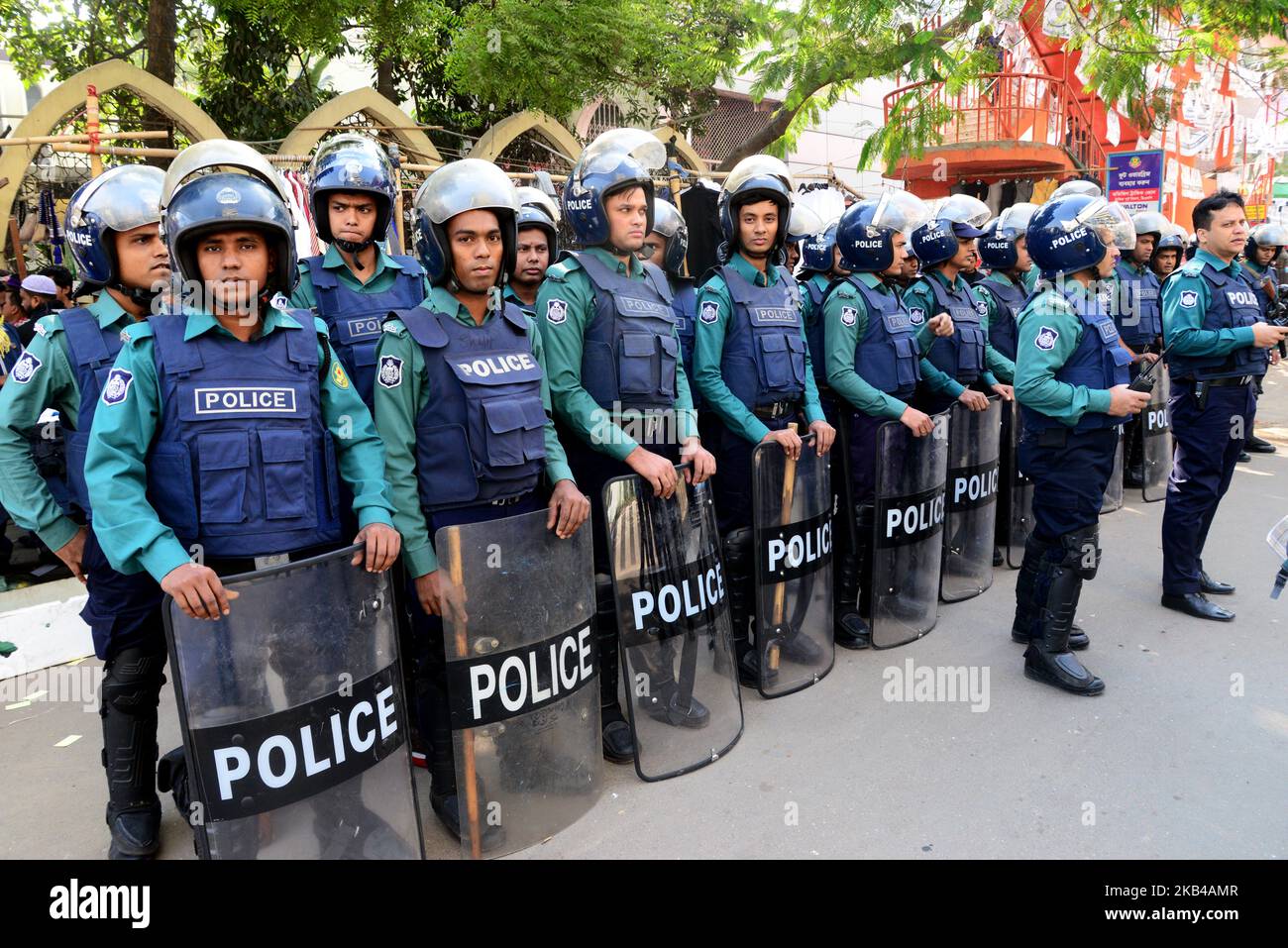 Bangladeshi Police stand guard in a street for the upcoming election in ...