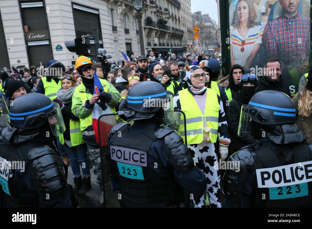 Protesters are blocked by the anti-riot police in the Avenue des Champs ...