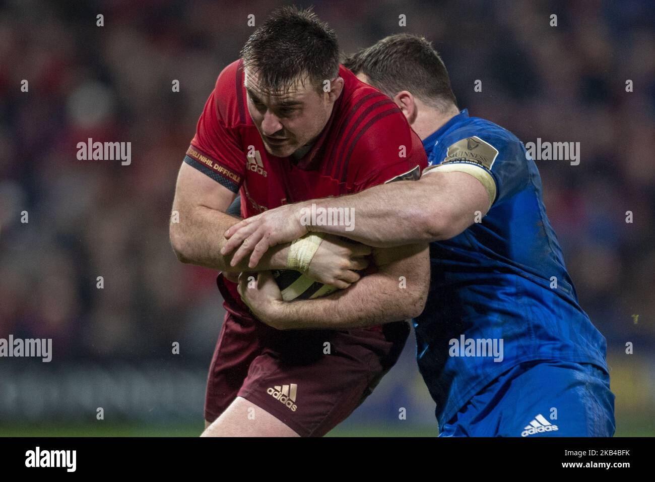 Niall Scannell of Munster tackled by Cian Healy of Leinster during the ...