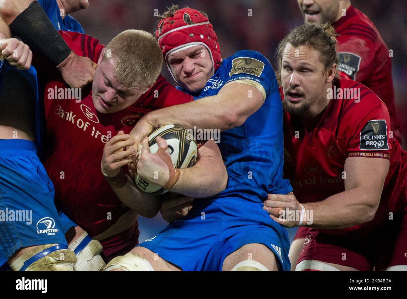 John Ryan of Munster tackled by Rhys Ruddock of Leinster during the ...