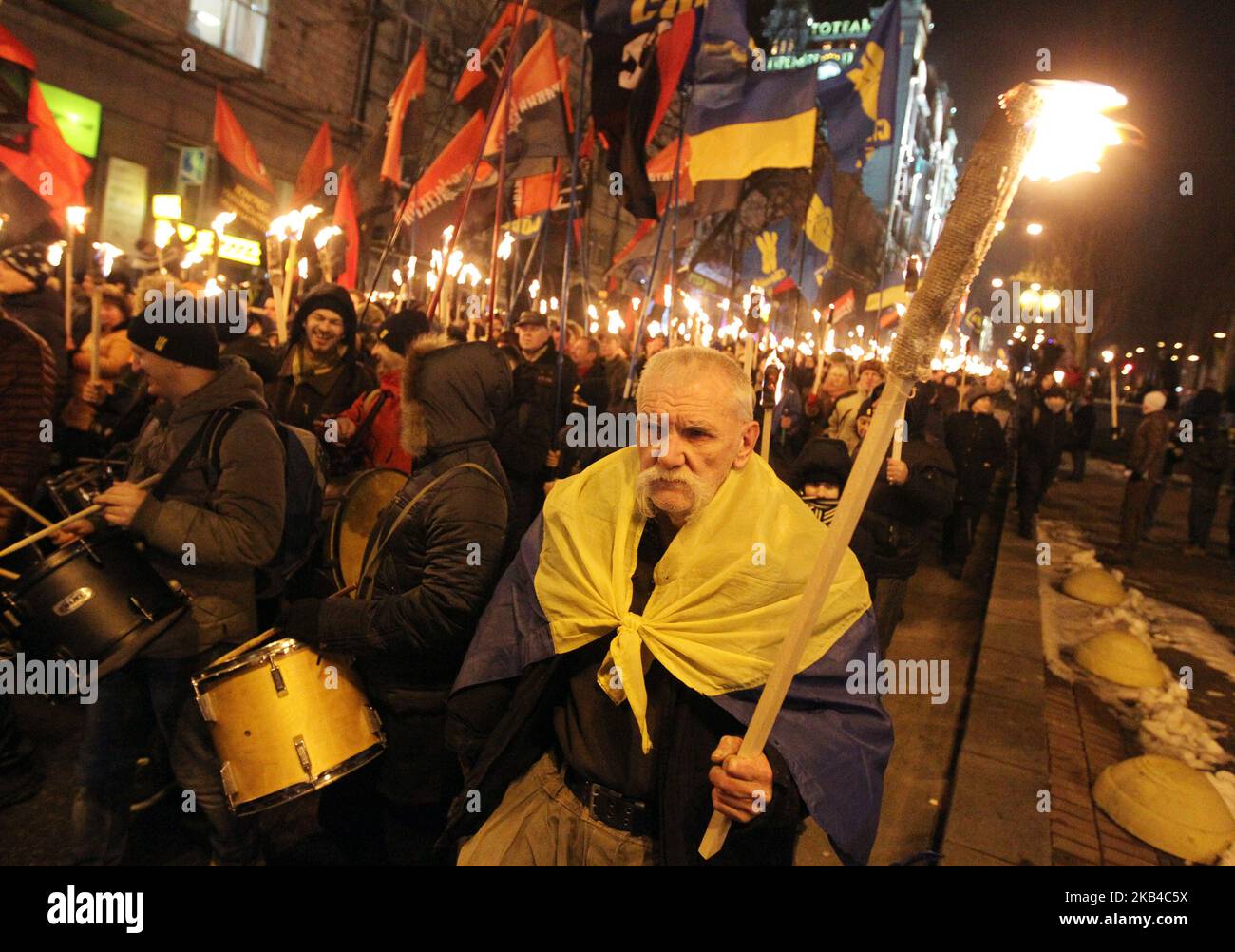 Ukrainian nationalists from different parties attend a march dedicated ...
