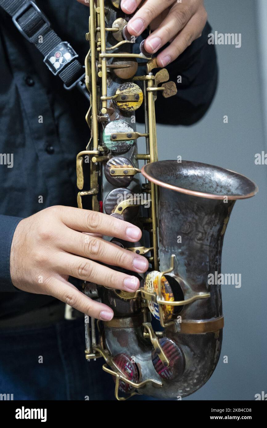 Recycled instrument during the presentation of the orchestra of ...