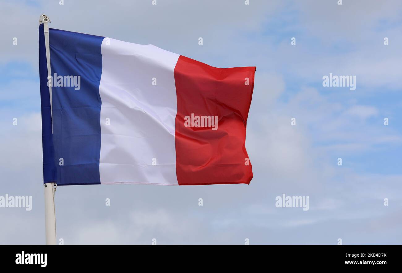 large French flag flying in Paris capital Stock Photo - Alamy