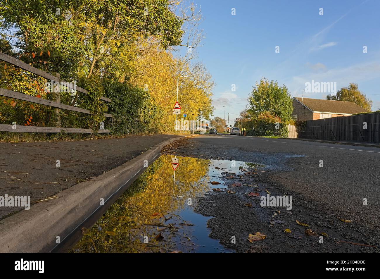 Puddle reflection in road hi-res stock photography and images - Alamy