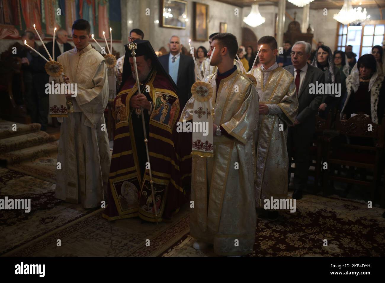 Palestinian Orthodox Christians attend a mass in the Church of Saint ...