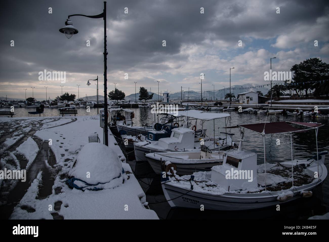 The weather phenomenon "Tilemachos" with snowfall even at the beach of ...