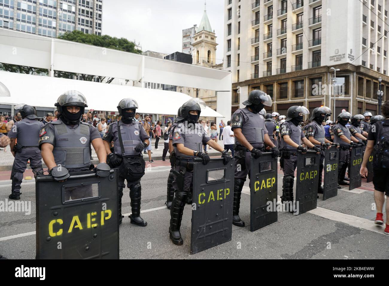 Military Police shock troops control the demonstrators march during a ...