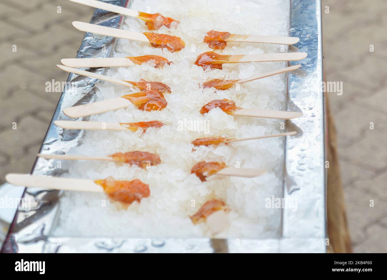 Maple taffy on snow hi-res stock photography and images - Alamy