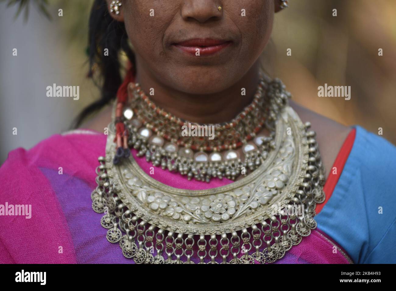 A portrait of Nepalese Tharu community women in a traditional attire ...