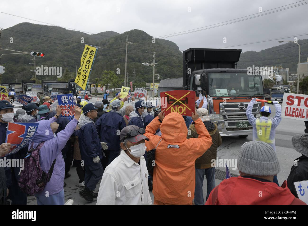 Anti U.S. Base protesters stage a rally outside the gate of Ryukyu ...