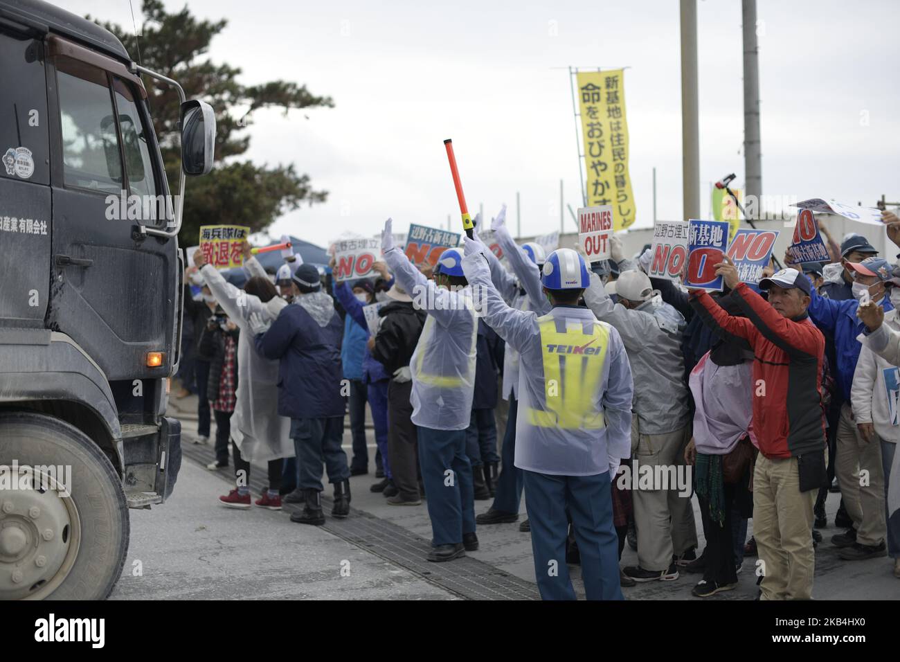 Anti U.S. Base protesters stage a rally outside the gate of Ryukyu ...