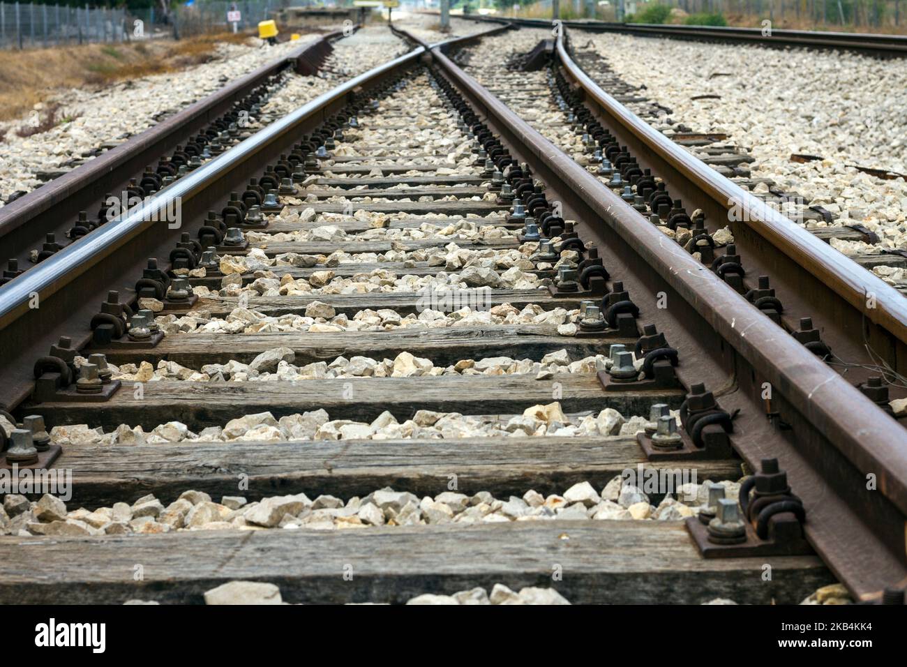 Railway tracks crossing of public Train Railroad Stock Photo - Alamy