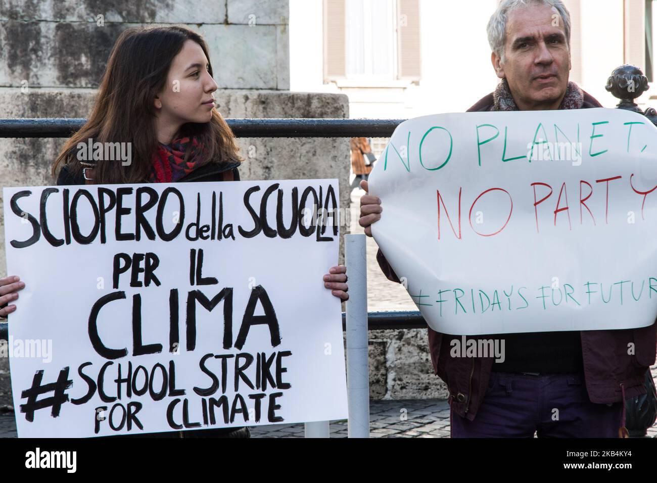 A protester protests against the inefficiency of policies on climate ...
